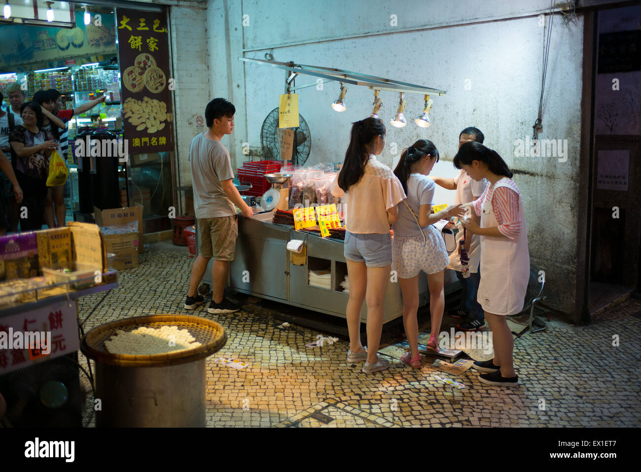 One of the many shops selling local Macanese snacks to tourists and ...