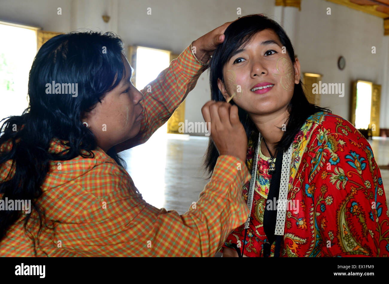 Burmese woman using tanaka makeup for traveler thai women at Atumashi ...