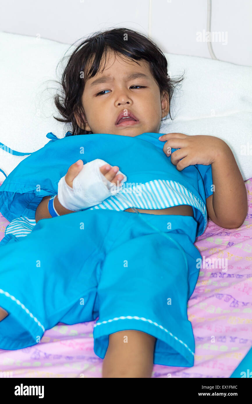 Illness little asian kids crying, asleep on a sickbed in hospital ...
