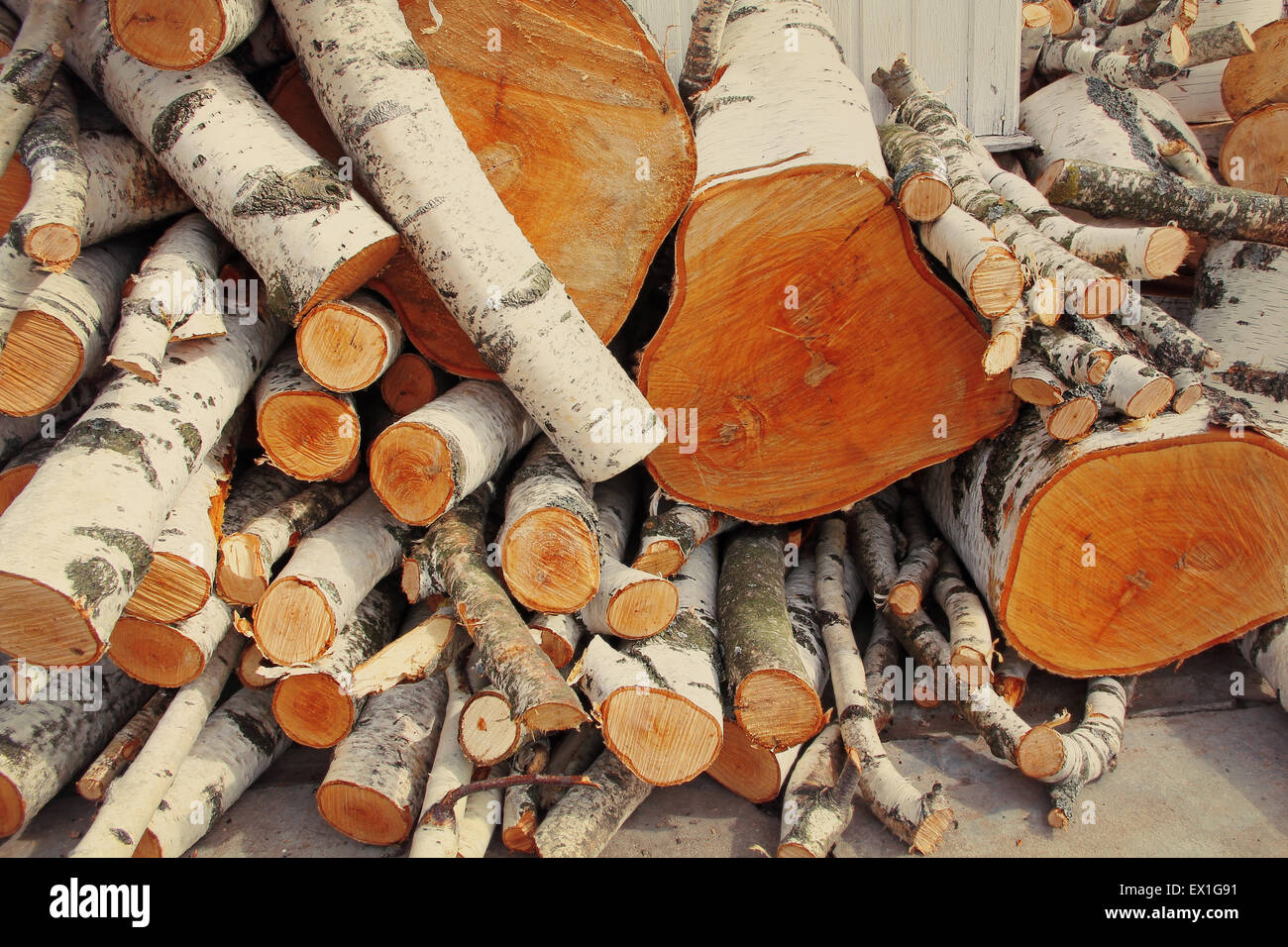 Pile of logs taken closeup.Toned image Stock Photo - Alamy