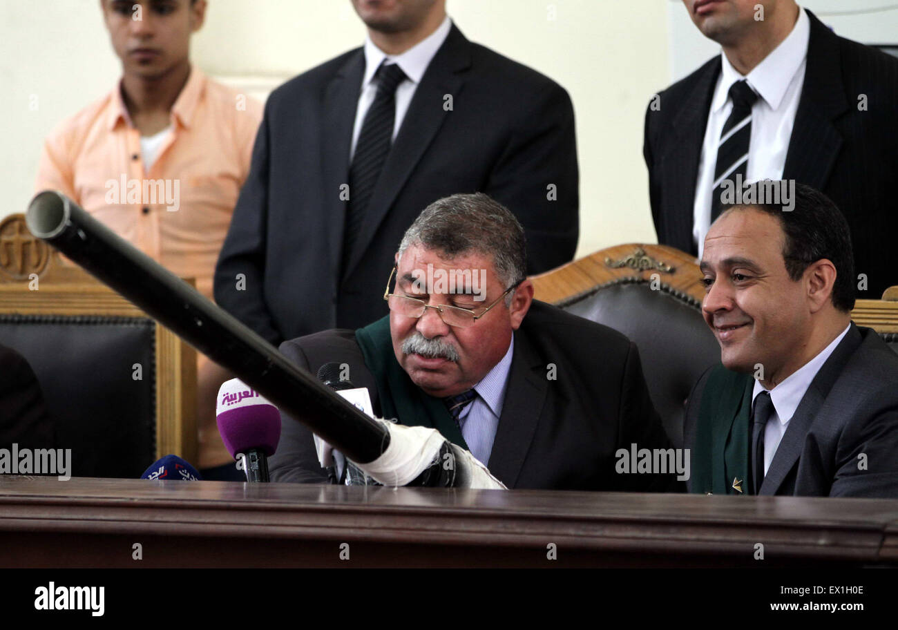 Cairo, Egypt. 4th July, 2015. Egyptian Judge displays the weapons used ...