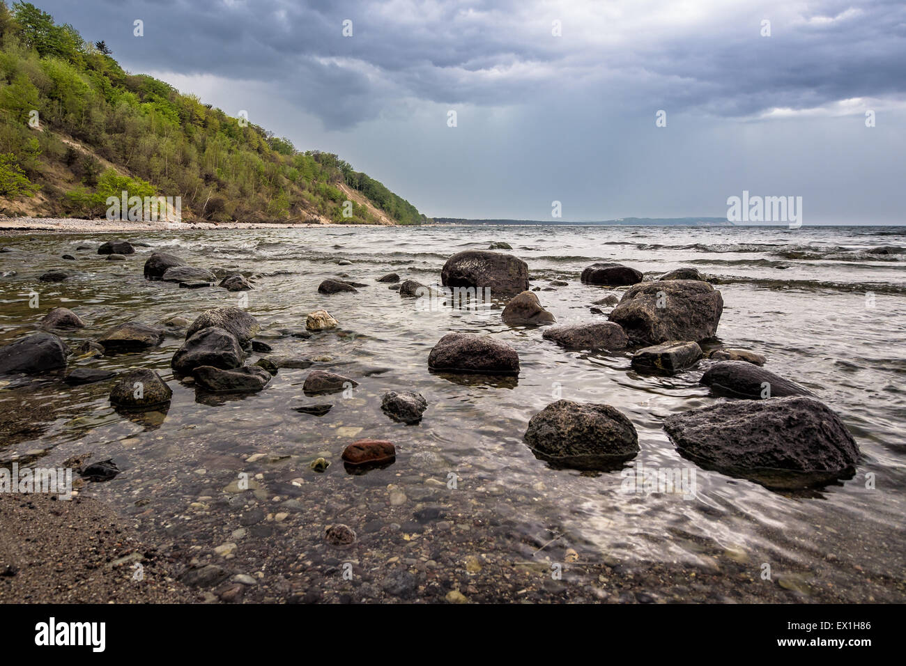 Rocks rocky shore coast sea sky hi-res stock photography and images - Alamy