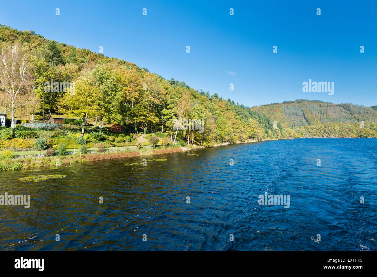 Lake Rursee Obersee shore with blue sky and sunlight in summer Stock ...