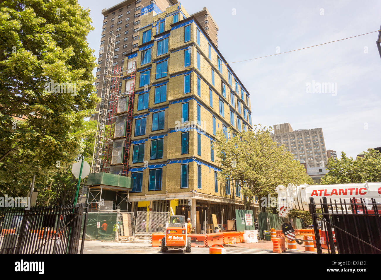 Construction on nARCHITECTS micro-unit modular apartments, branded ...