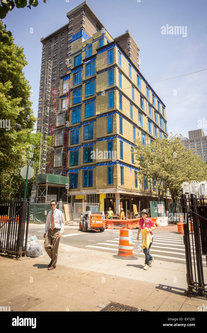 Construction on nARCHITECTS micro-unit modular apartments, branded ...