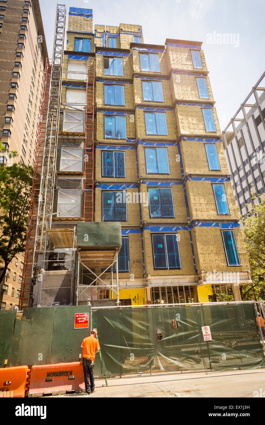 Construction on nARCHITECTS micro-unit modular apartments, branded ...