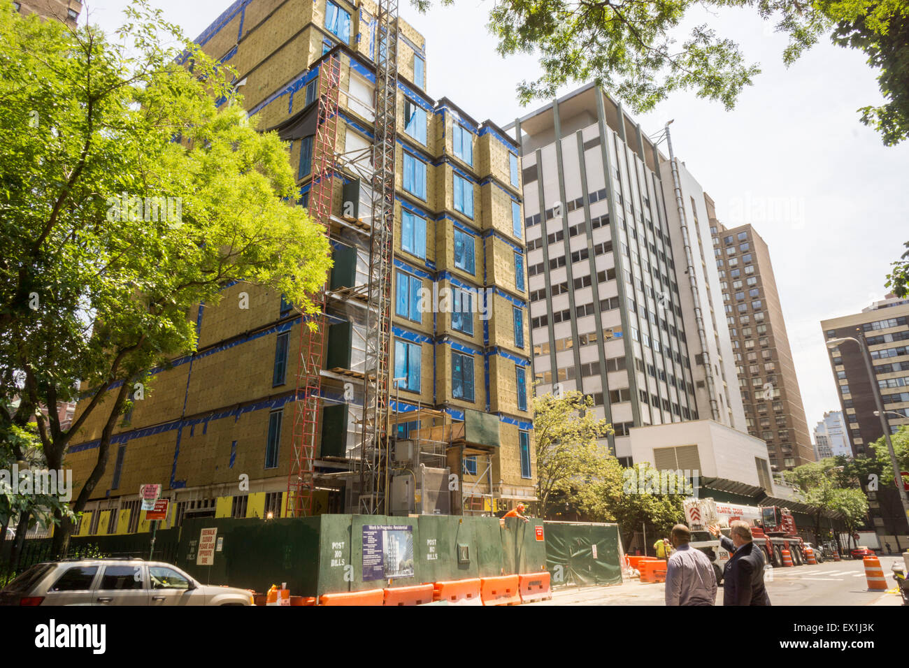 Construction on nARCHITECTS micro-unit modular apartments, branded ...