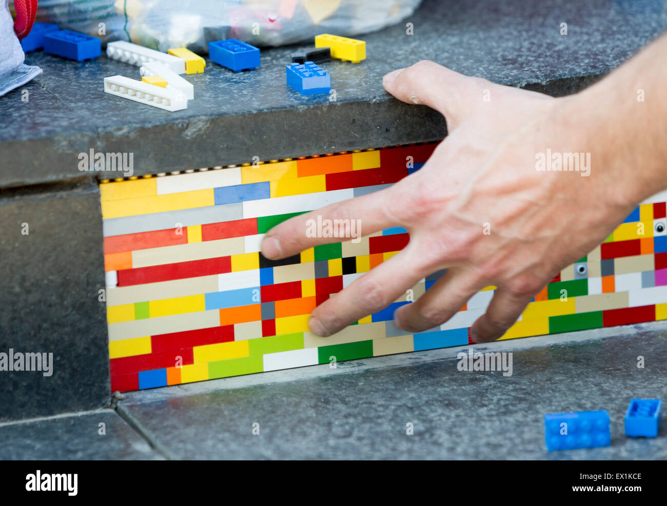 Sofia, Bulgaria - June 6, 2015: The artist Jan Vormann is filling the ...