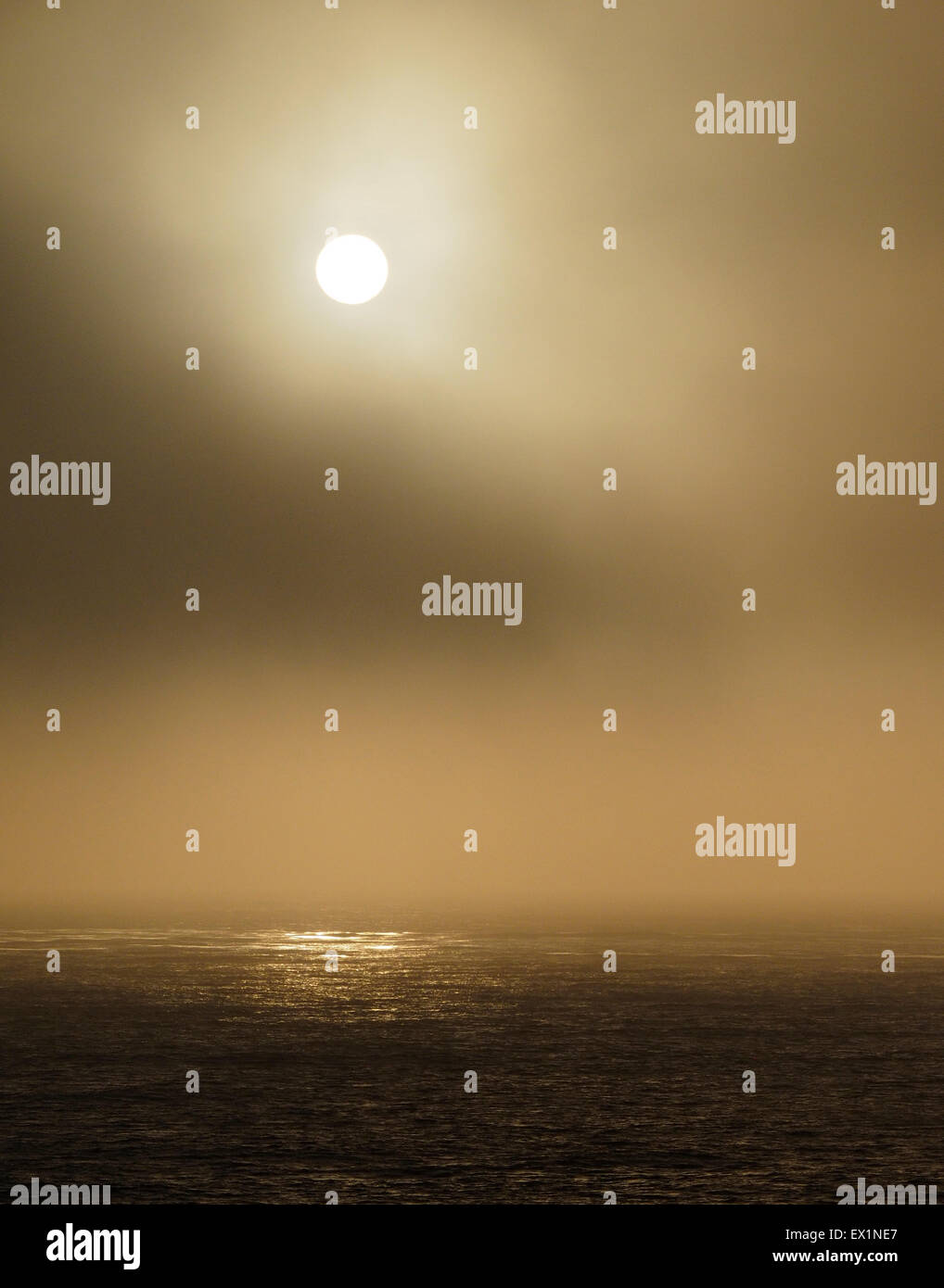 Sunset over ocean through hi-res stock photography and images - Alamy