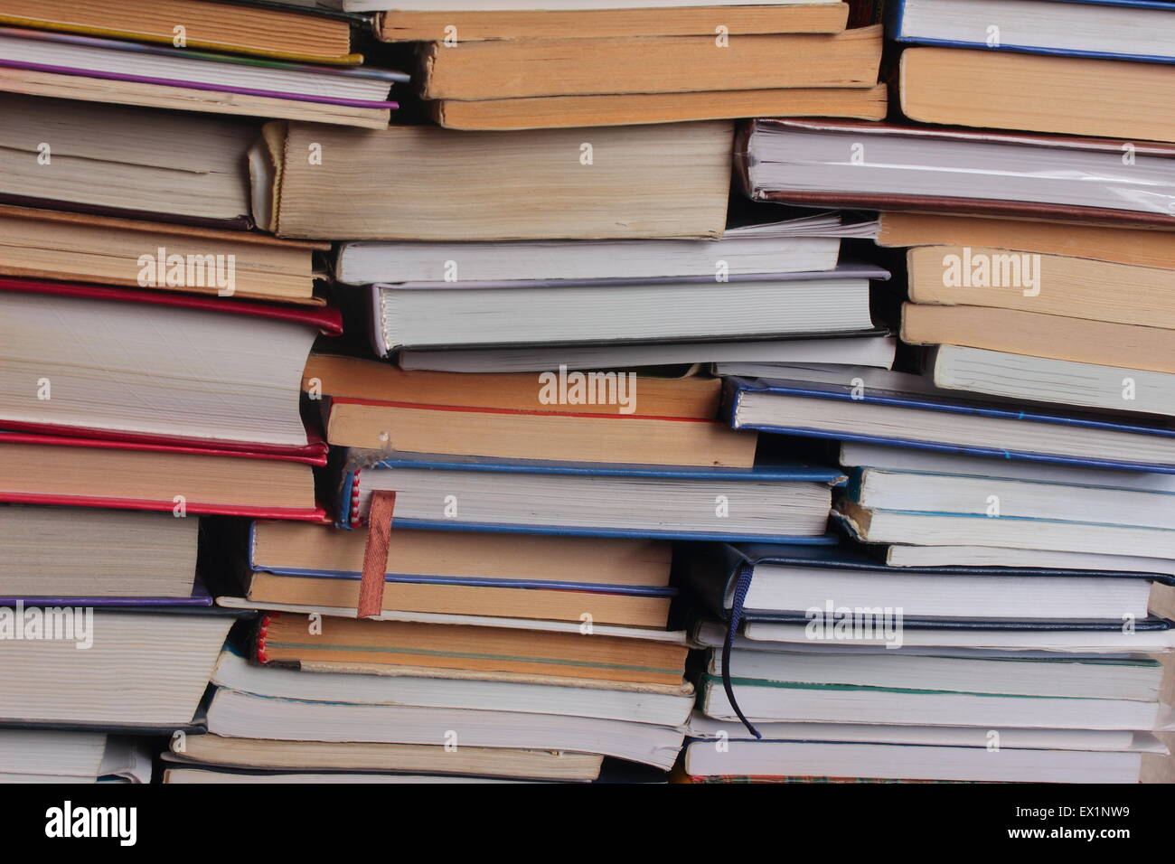 is a stack of different books to read Stock Photo - Alamy