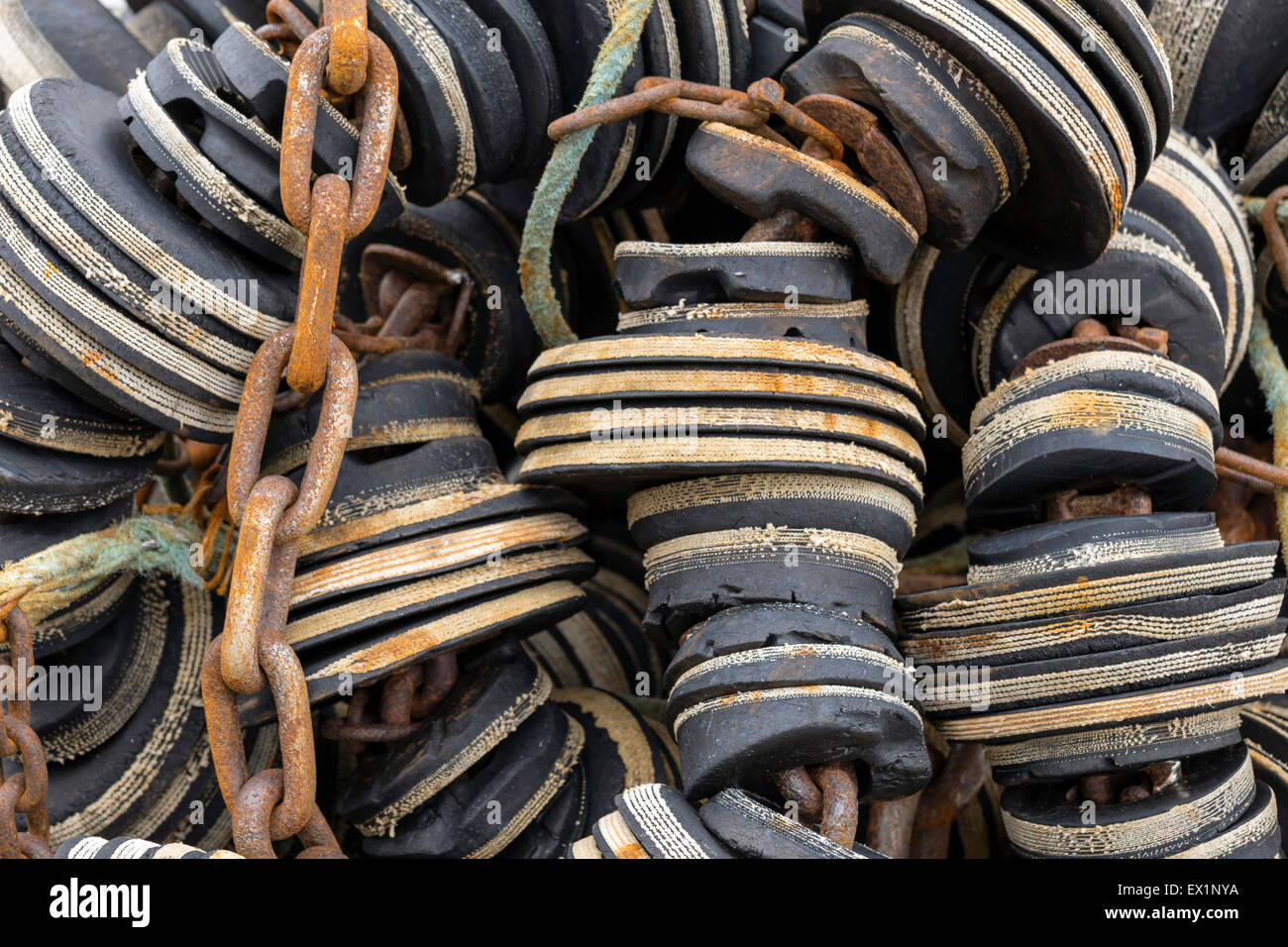 Rubber rings around chains to protect ships from scratching- harbor of ...