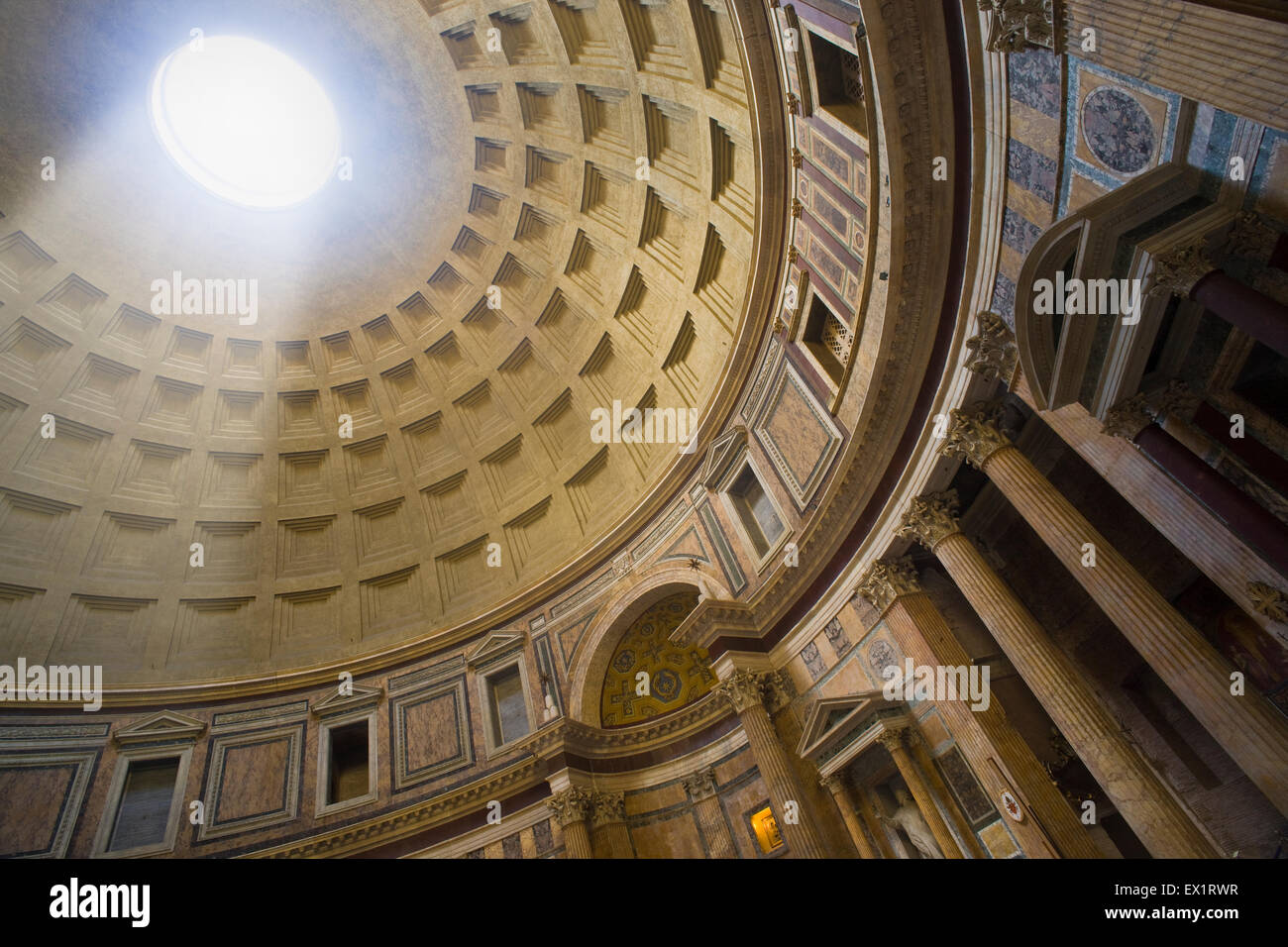 Interior of the Pantheon with a beam of light coming from the oculus ...