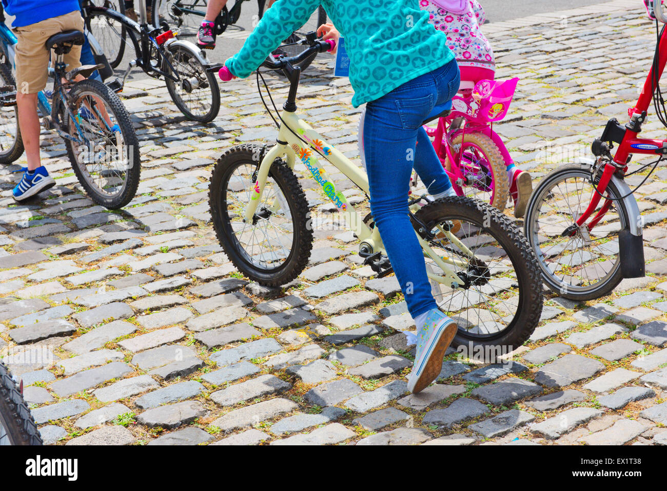 Family cycling Sky Ride event Stock Photo - Alamy
