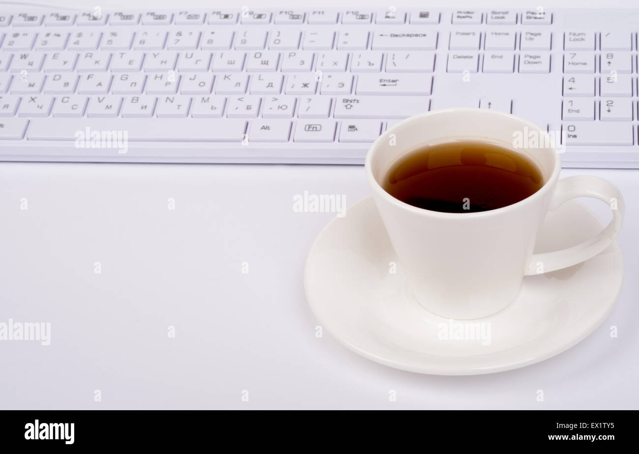 Computer keyboard and coffee Stock Photo - Alamy