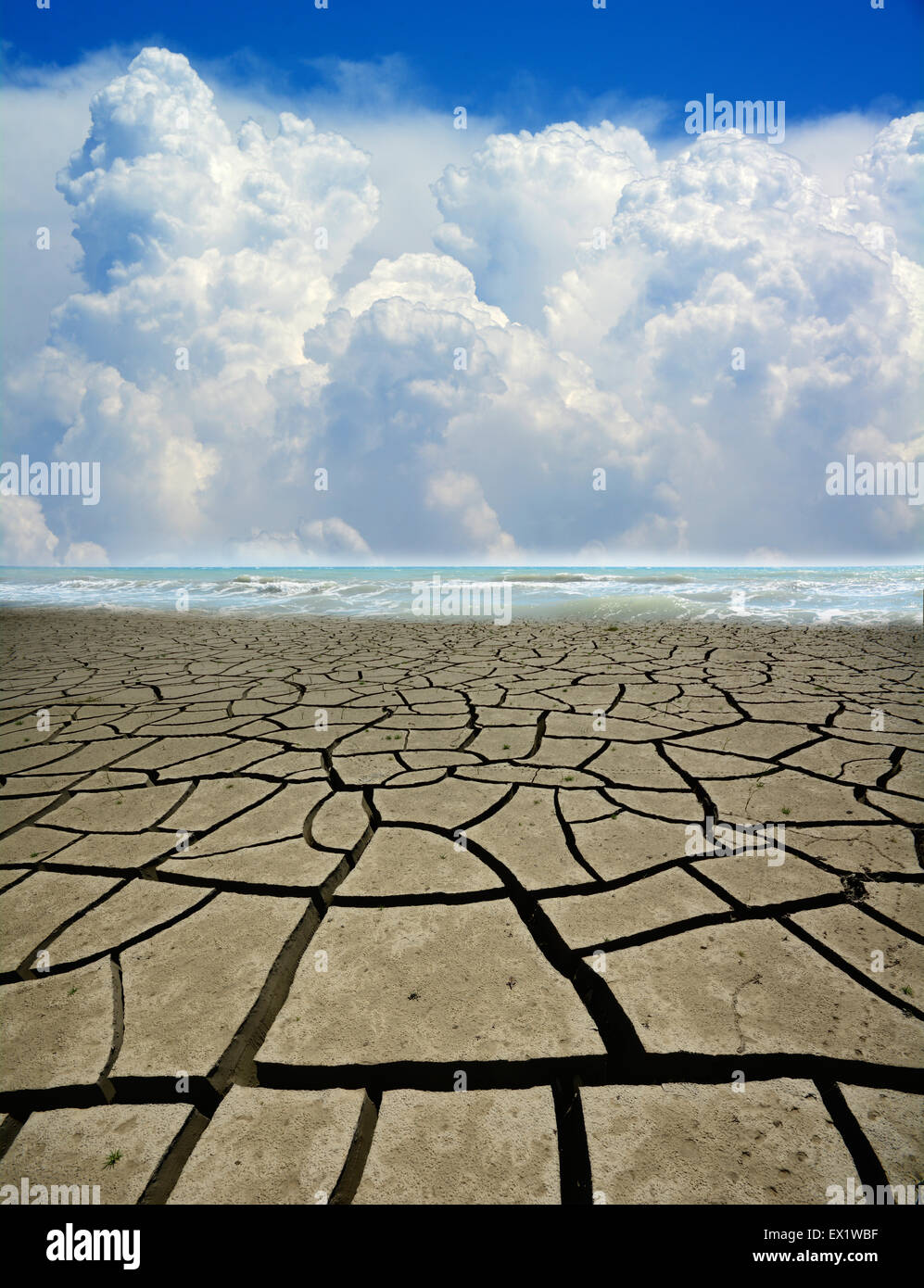 Dry soil, storm clouds and sea together Stock Photo - Alamy