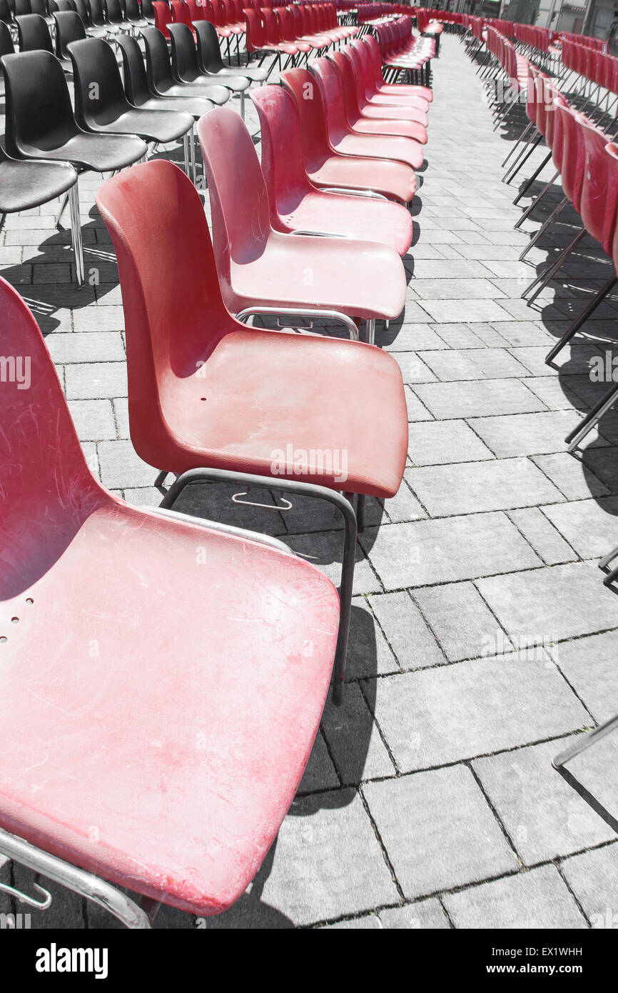 red chair lined. Image of a tens of red chairs lined Stock Photo - Alamy