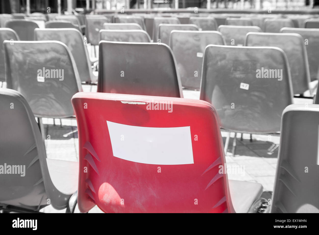 red chair lined. Image of a tens of red chairs lined Stock Photo - Alamy