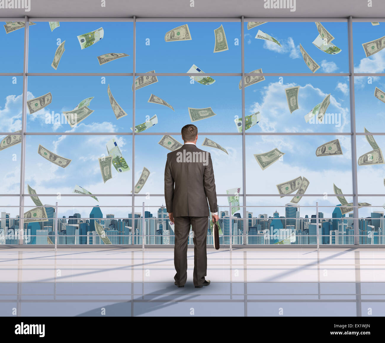 Businessman looking at money Stock Photo - Alamy