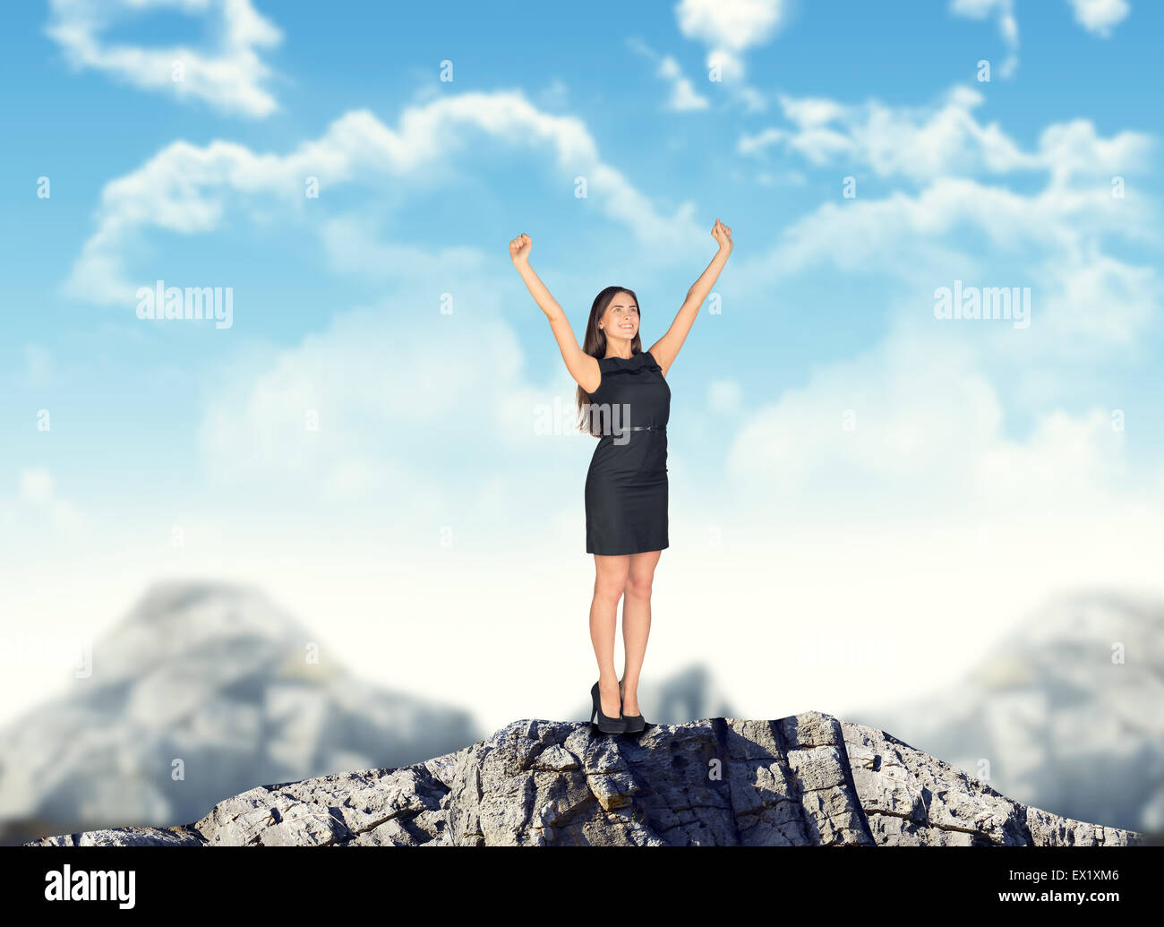 Businesswoman standing mountain top hi-res stock photography and images ...
