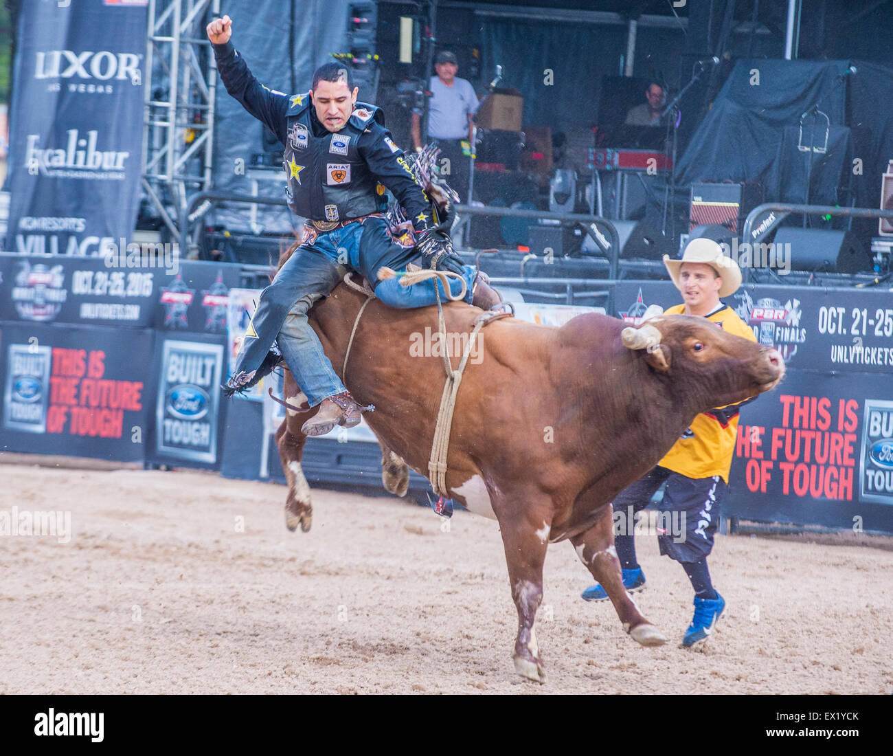 Cowboy Participating in a Bull riding Competition at the Las Cowboy ...