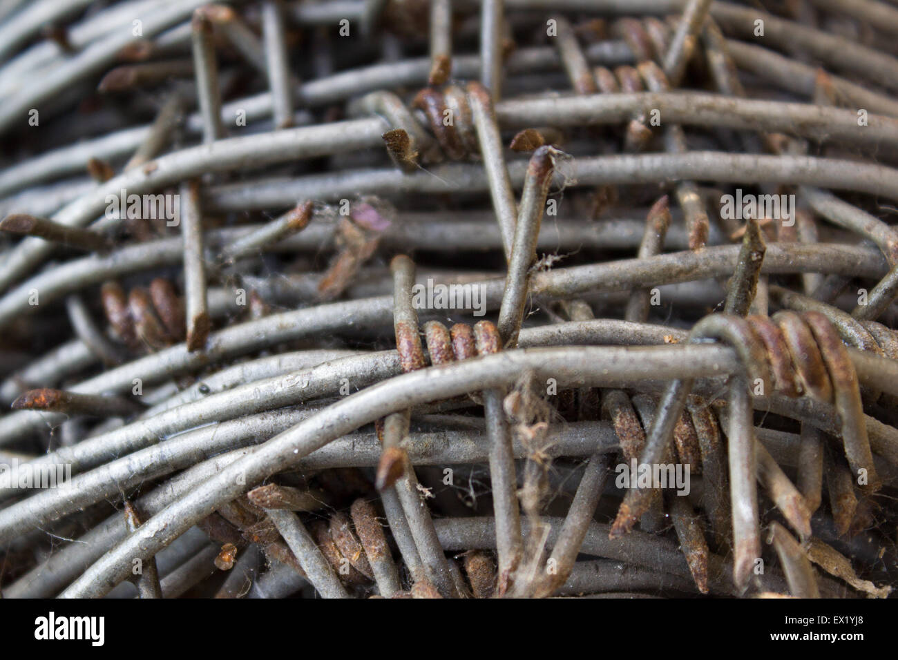 Barbed wire background Stock Photo - Alamy