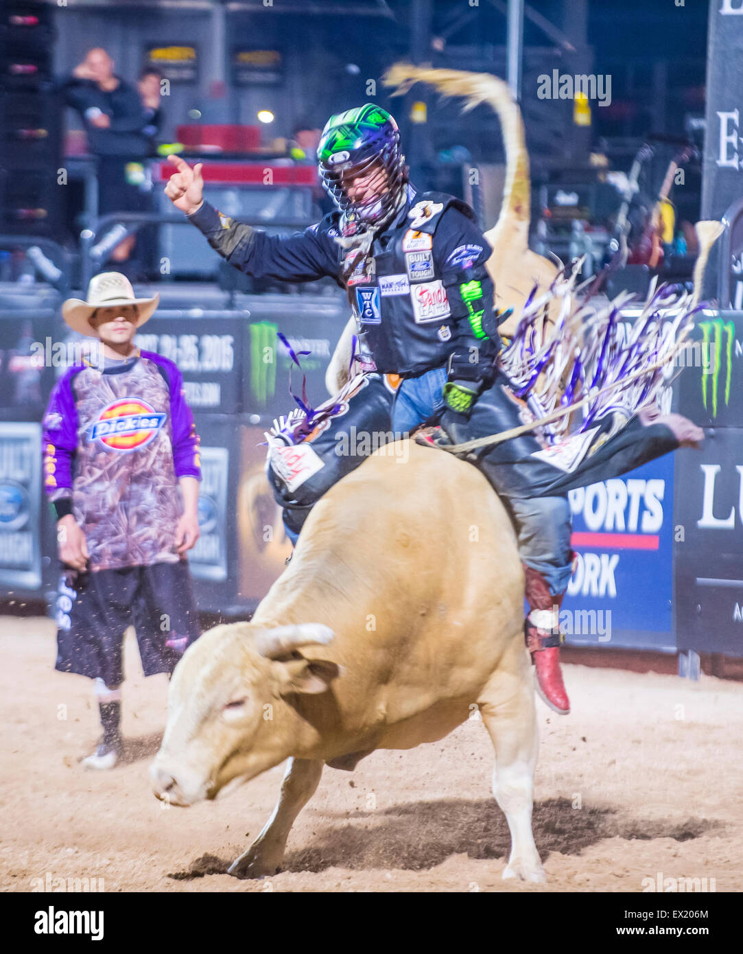 Cowboy Participating in a Bull riding Competition at the Las Cowboy ...