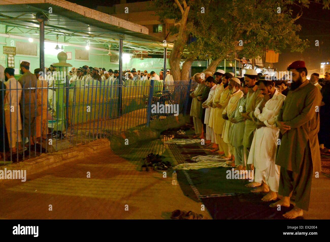 Quetta. 4th July, 2015. Muslims take part in prayer "Taraweeh" during ...