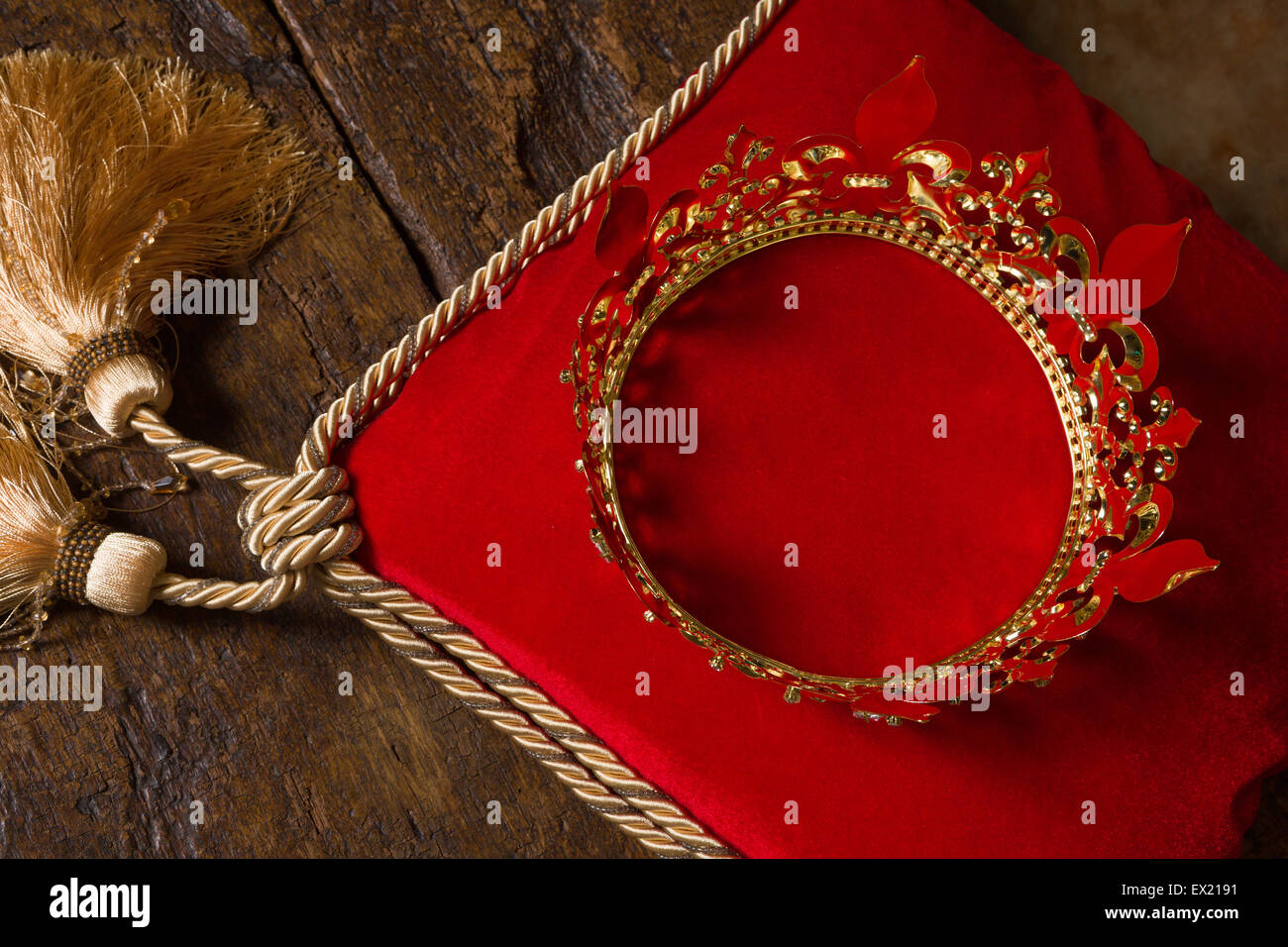 Medieval golden king's crown on red velvet pillow Stock Photo - Alamy