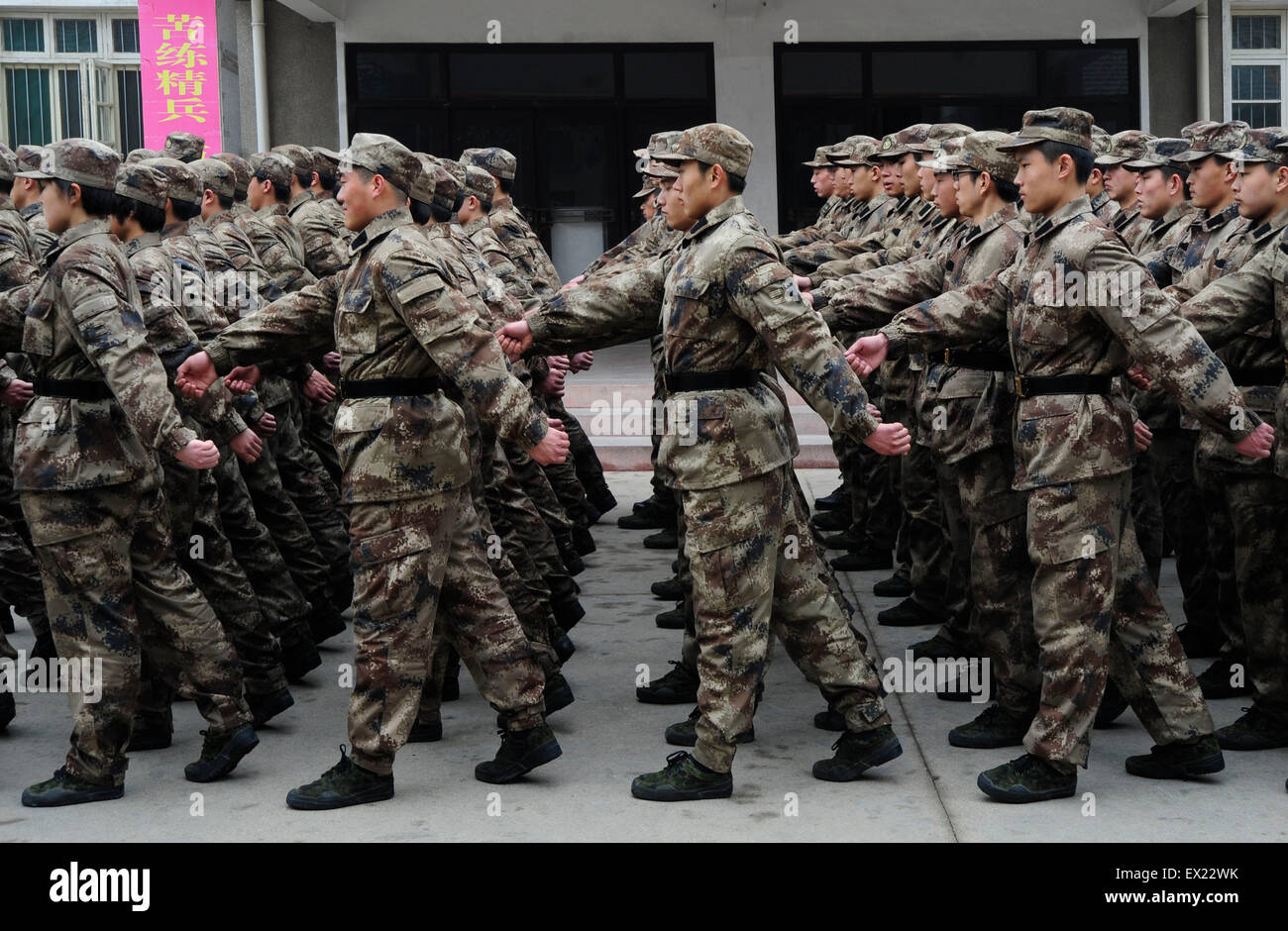 Recruits of People's Liberation Army (PLA) attend a regular training at ...