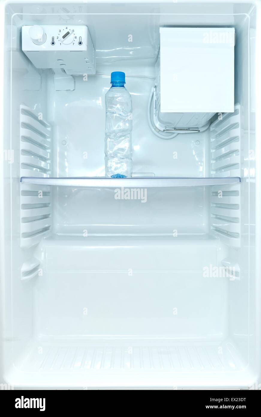 A shot of an open bar fridge Stock Photo - Alamy