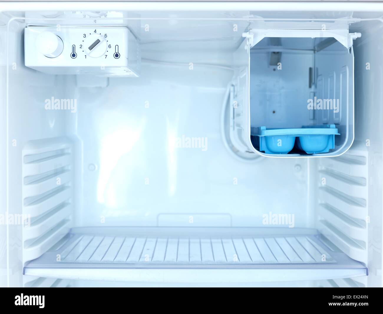 A shot of an open bar fridge Stock Photo - Alamy