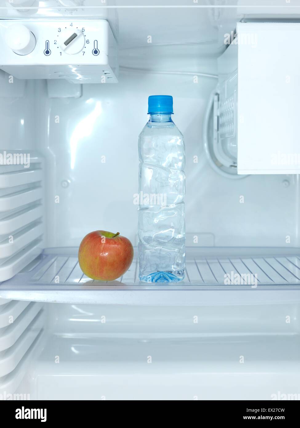 A shot of an open bar fridge Stock Photo - Alamy