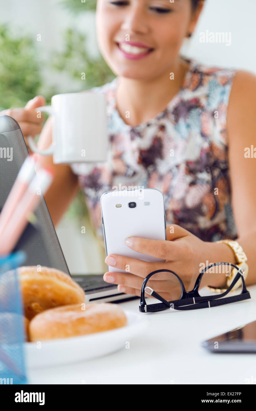 Portrait of young beautiful women working in the office Stock Photo - Alamy