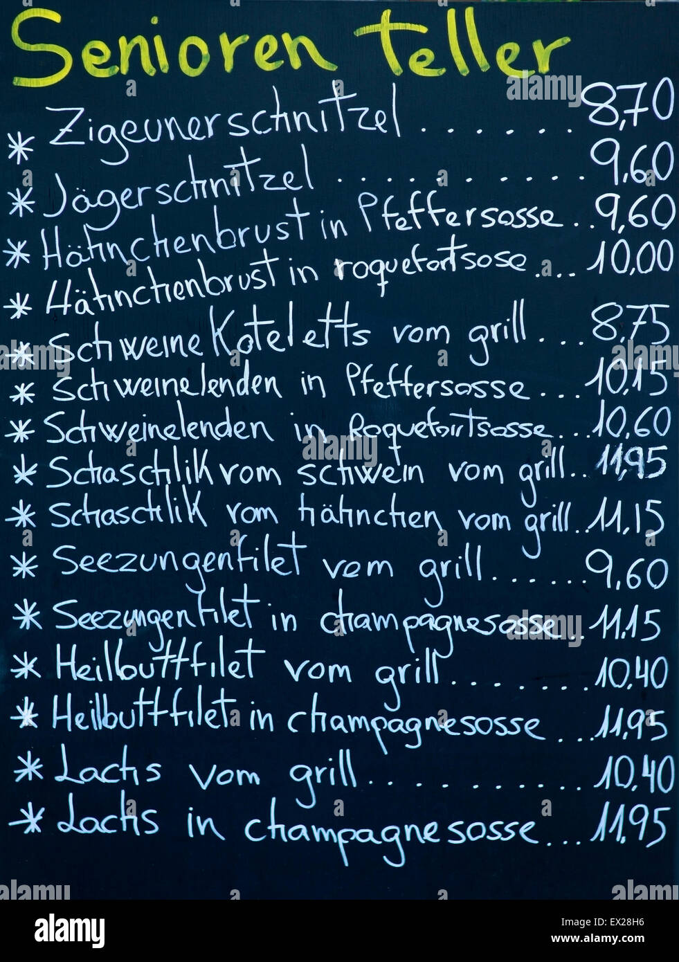 Menu written with chalk on a blackboard Stock Photo - Alamy
