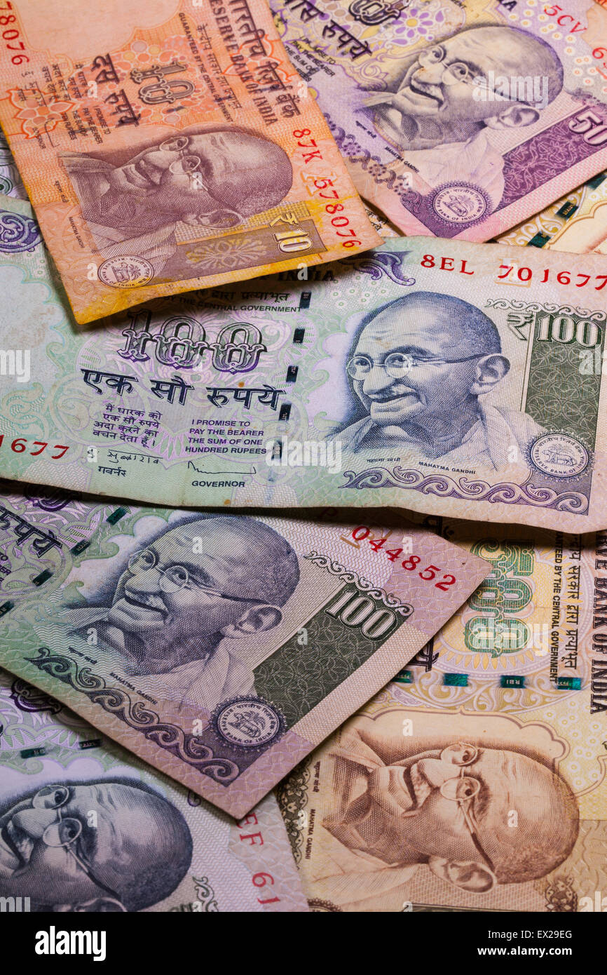 Different banknotes from India on the desk Stock Photo - Alamy