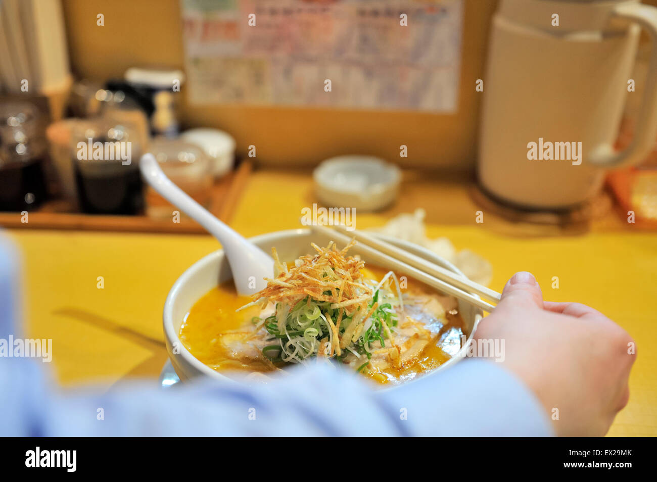 Eating Japanese ramen at a restaurant Stock Photo - Alamy