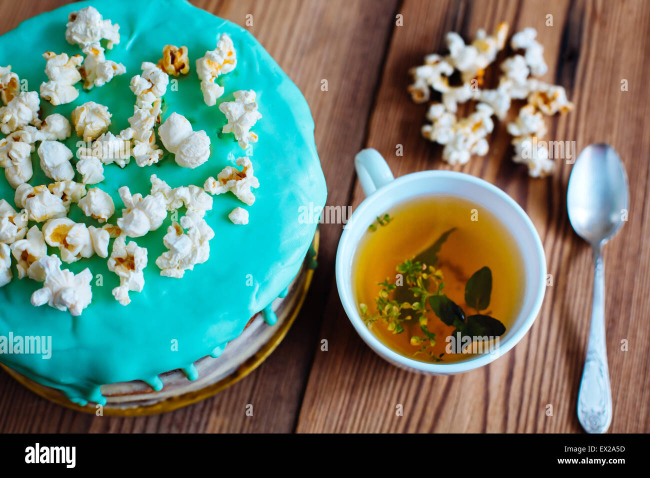 morning tea time cake turquoise cap spoon popcorn Stock Photo - Alamy