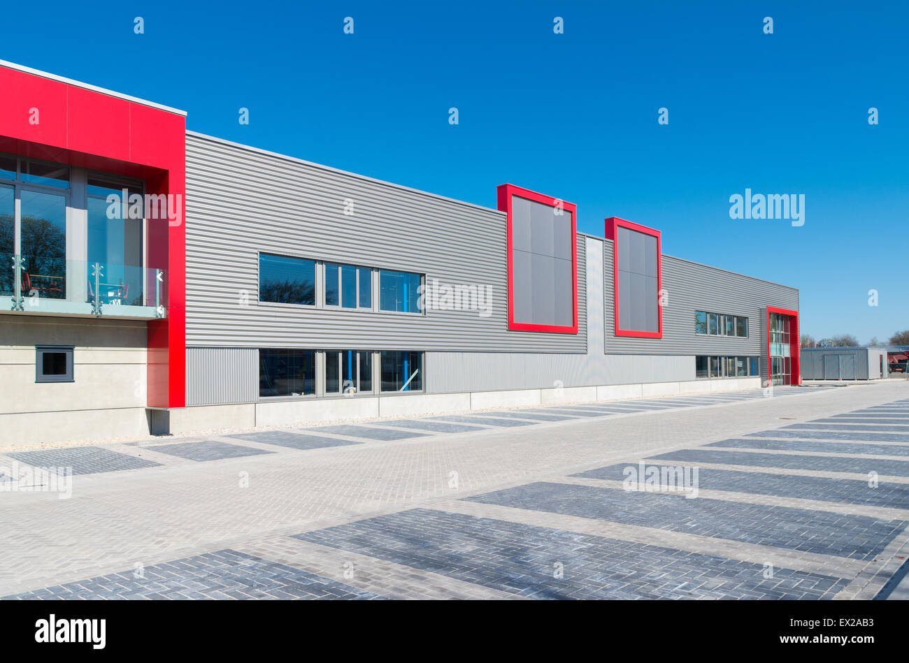 newly build modern red office building with warehouse Stock Photo - Alamy