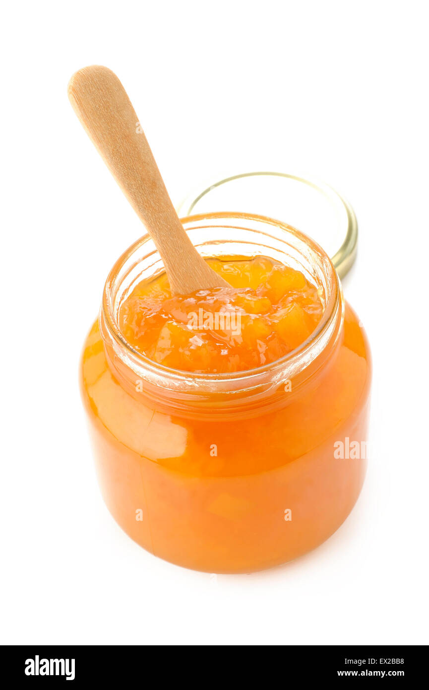 Jar of peach jam on white background Stock Photo - Alamy