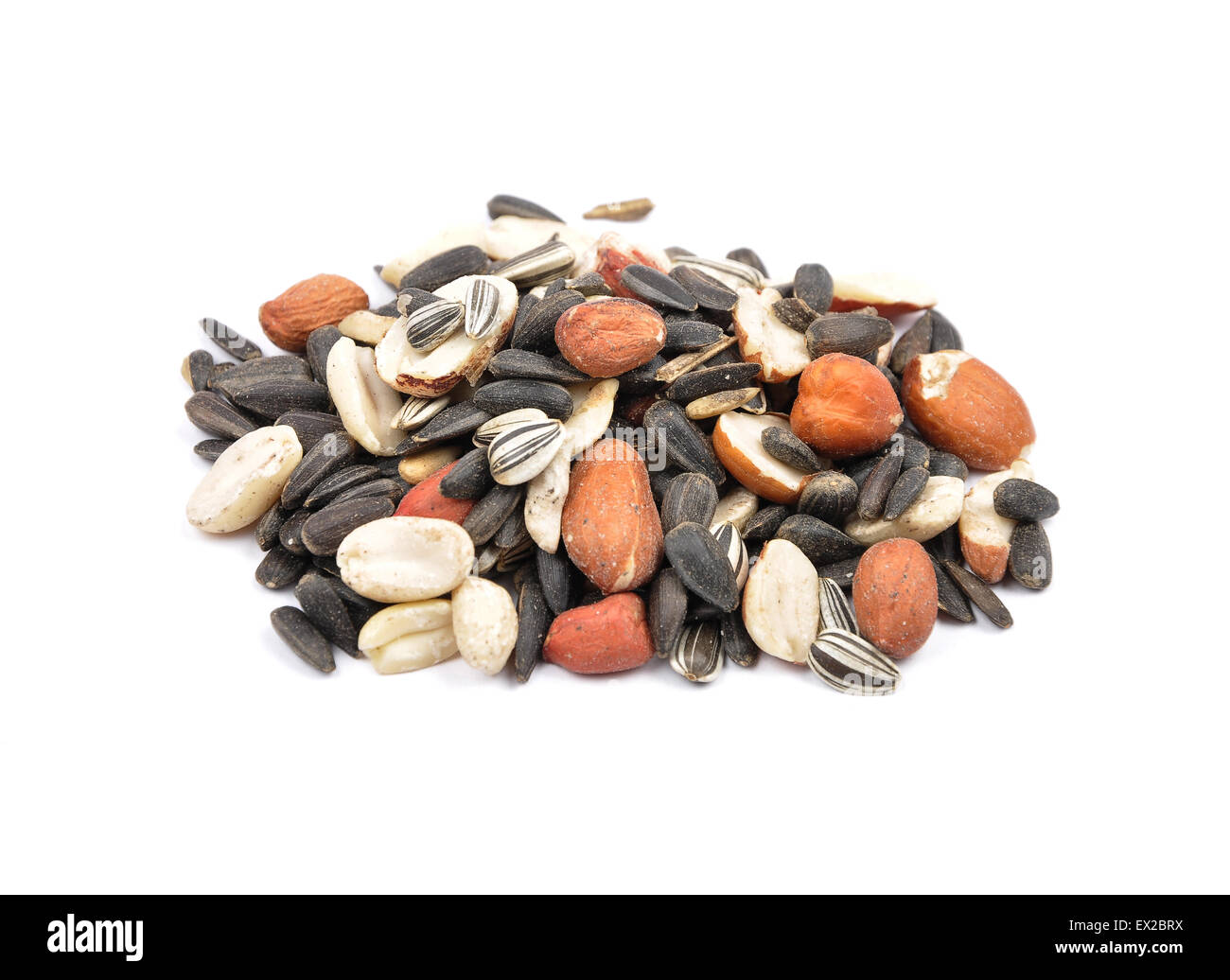 Bird seed on white Stock Photo - Alamy