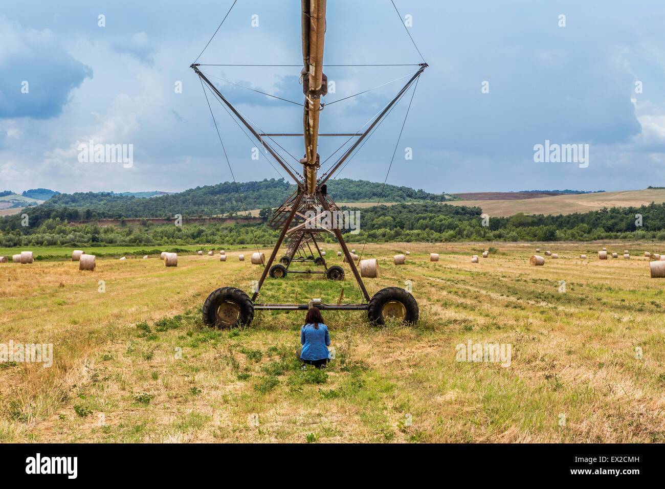A large wheeled irrigation system in a field Stock Photo - Alamy