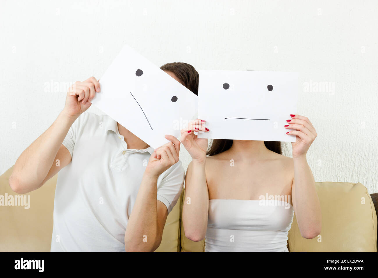 Young couple having troubles. Worrying young couple. Sad teenagers in ...