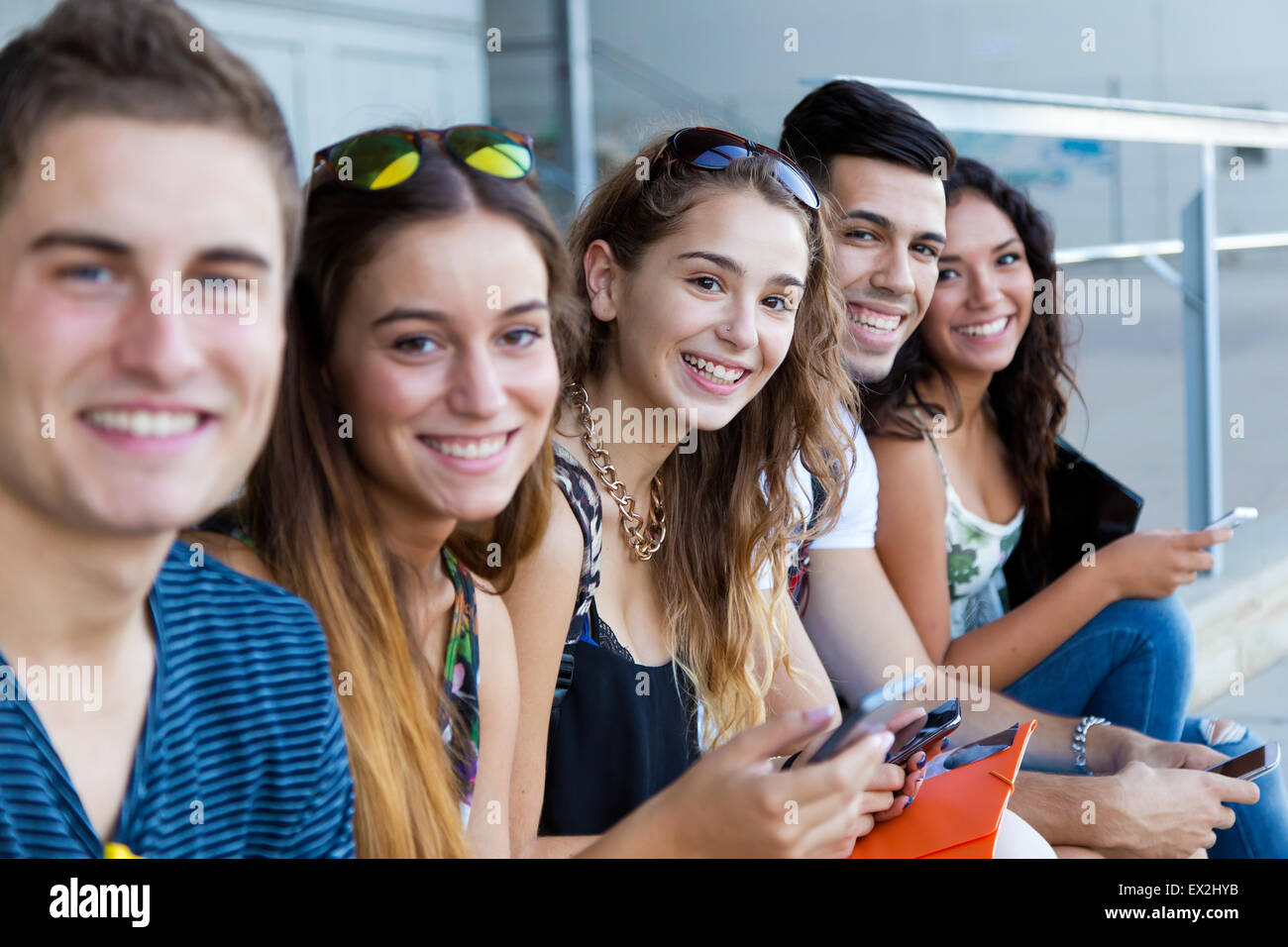 Group students laughing class hi-res stock photography and images - Alamy