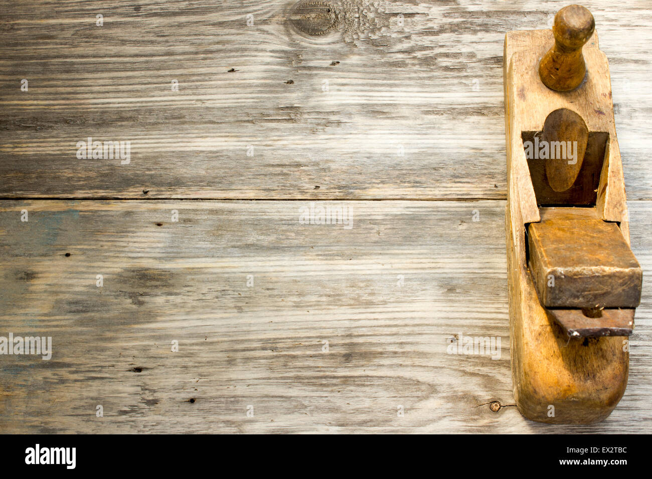 Old wooden jointers on the wood table with grunge texture Stock Photo ...