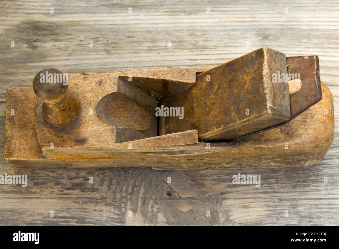 Old wooden jointers on the wood table with grunge texture Stock Photo ...