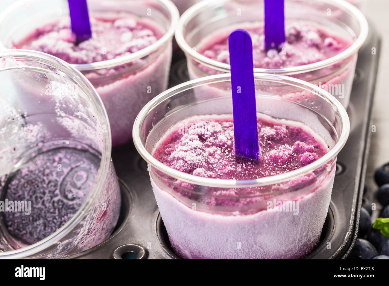 Homemade fruit popsicle made in plastic cups Stock Photo - Alamy