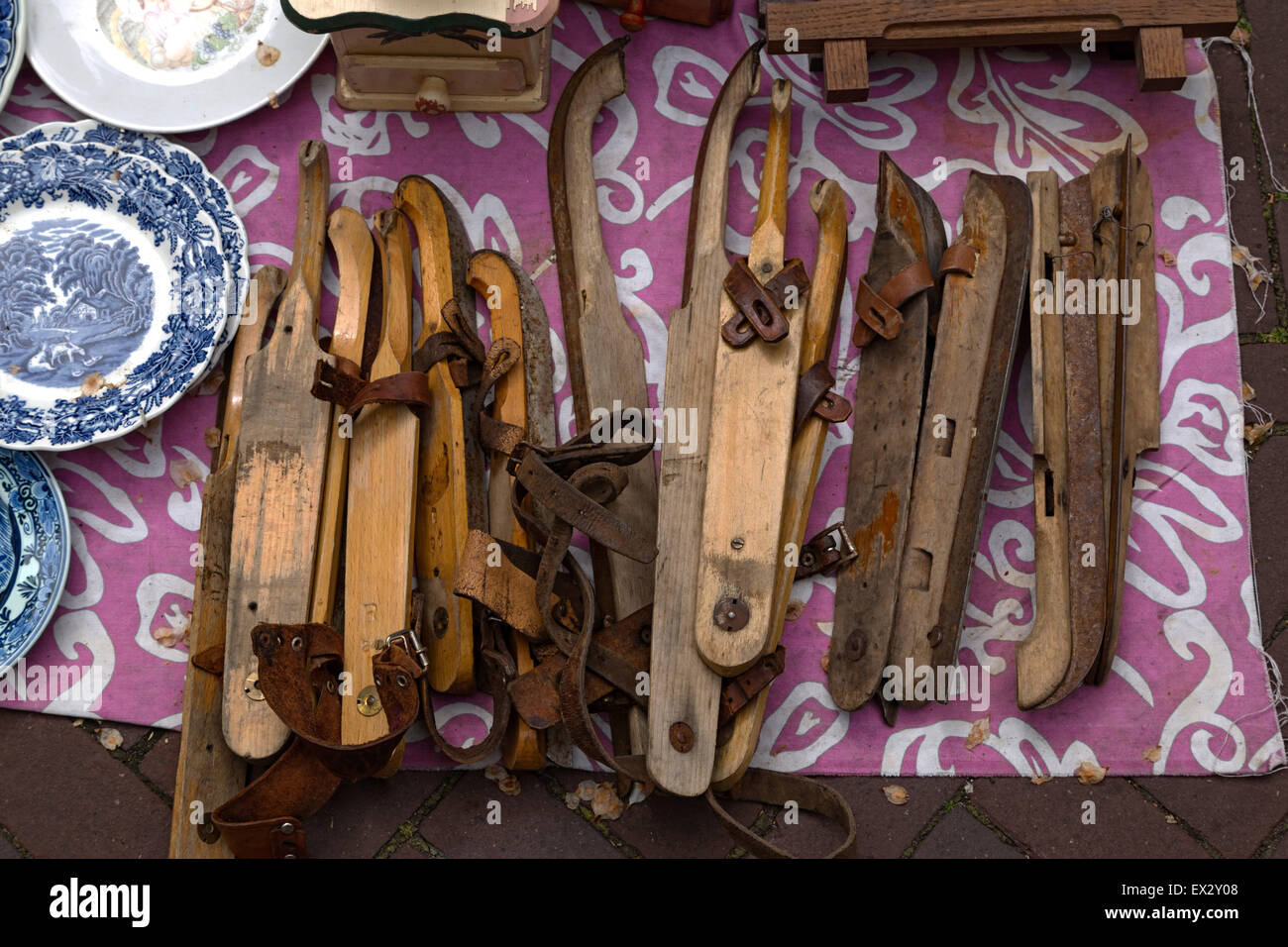 Old Dutch skates for sale, in a street market, along the canals in the ...