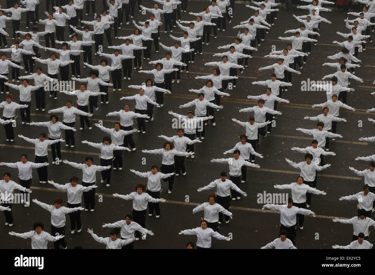 Participants perform during a mass parade to celebrate the lantern ...