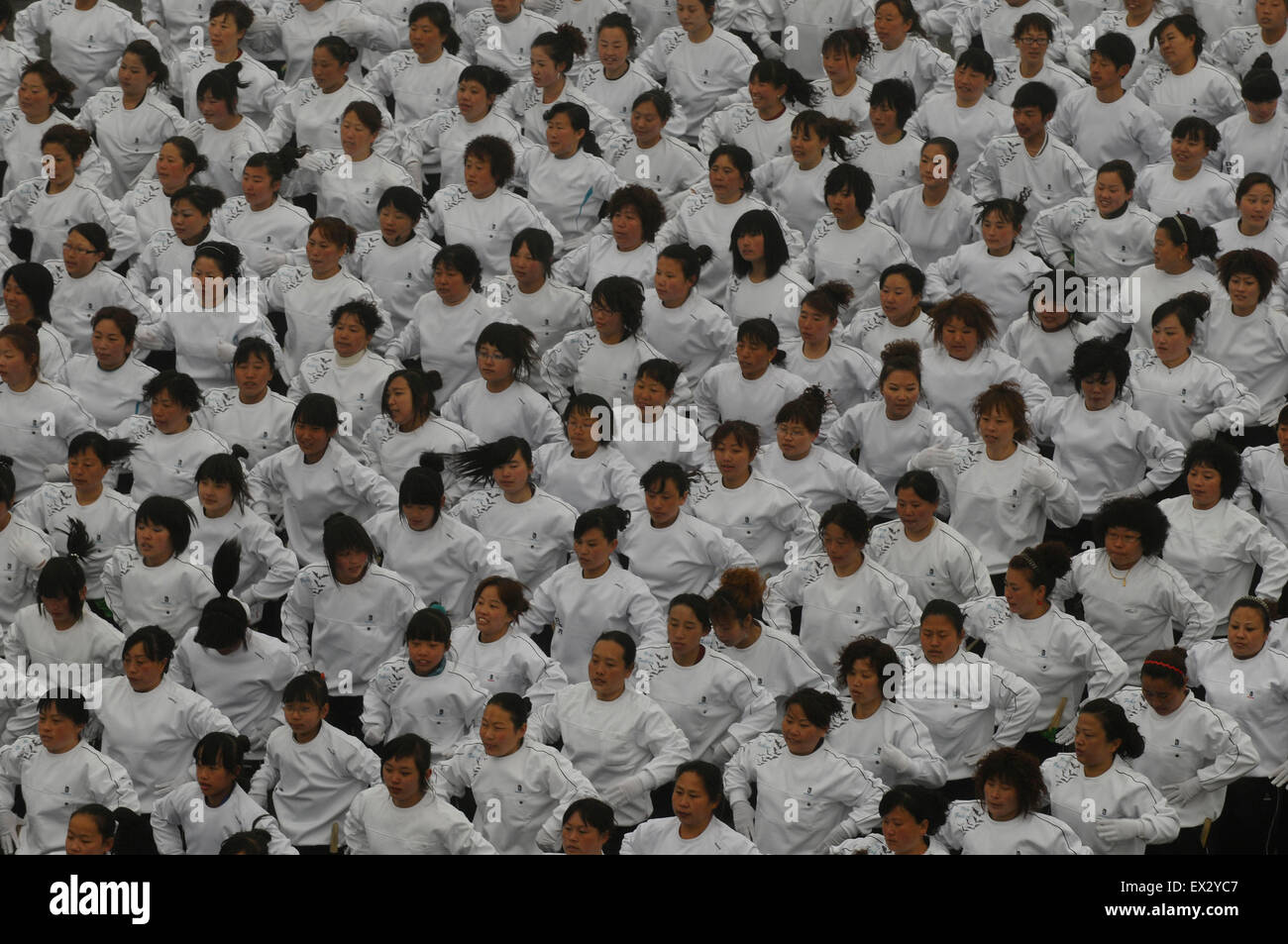 Participants perform during a mass parade to celebrate the lantern ...