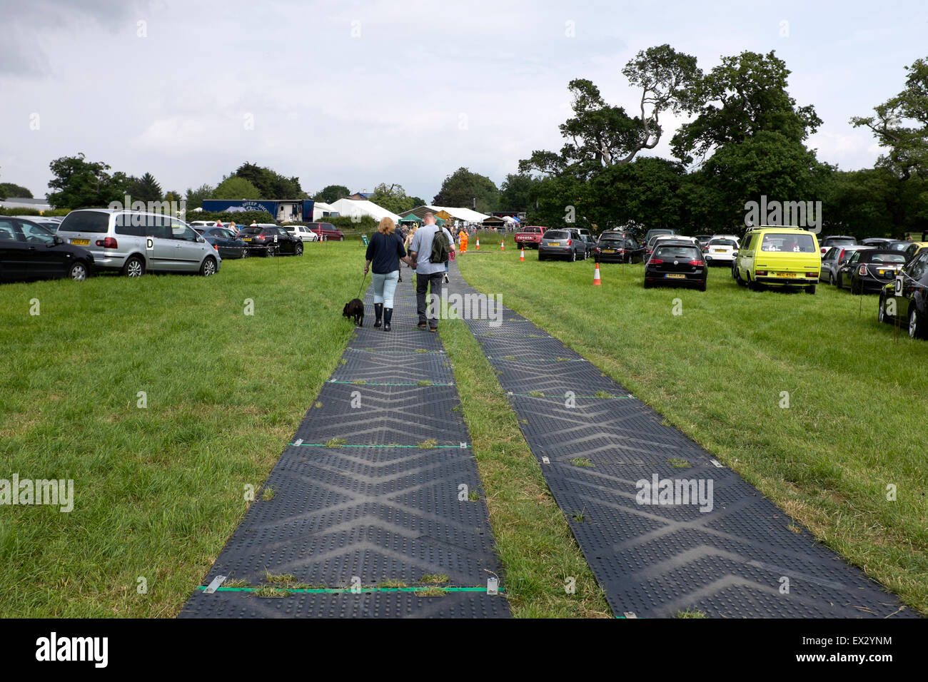 Temporary Roadway Road on Grass Festival Mud Wet Stock Photo - Alamy
